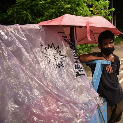 Manila’s homeless find shelter in pushcarts that are used as storage ...