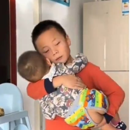 Loving children in China: boy plays nanny with baby brother, kids tease ...
