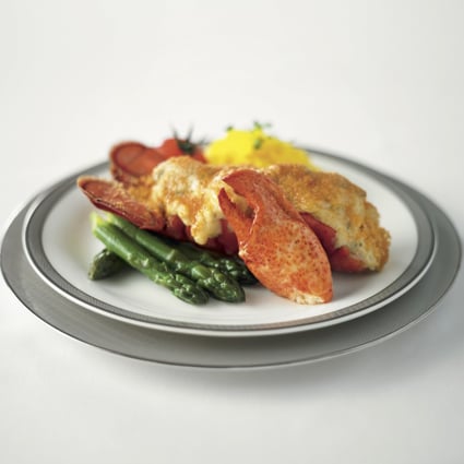 Major airline caterer swaps prawns for chicken on flight menus to cut ...