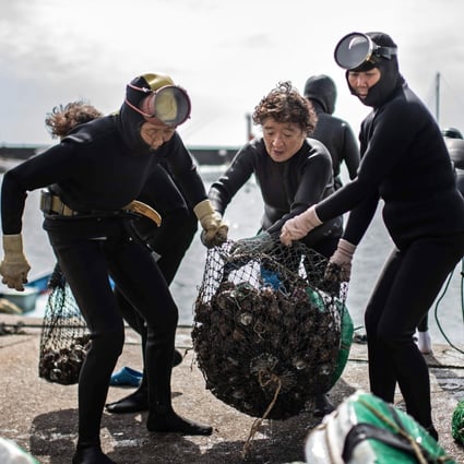Japan’s ‘ama’ divers struggle to stay afloat as rising sea temperatures ...