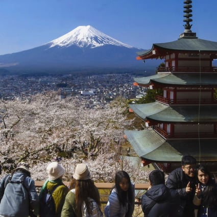 Japanese ‘mindset’ is to stay home as Covid wave, surging flight costs ...