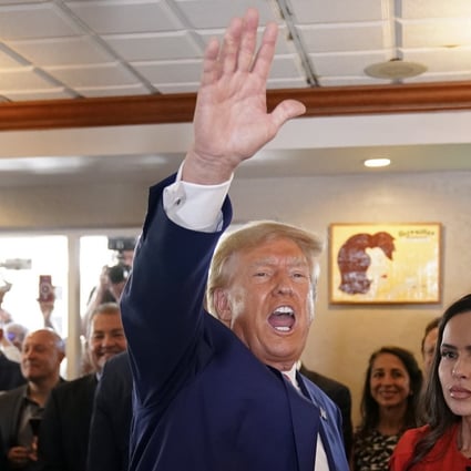 Trump tells restaurant patrons ‘food for everyone’, then leaves without ...