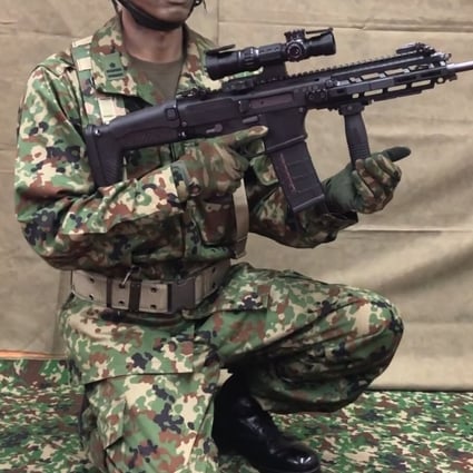 Japan unveils new assault rifle, amid rising tensions in East China Sea ...