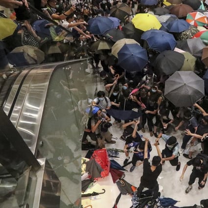Hong Kong protests: two men, teenager jailed for up to four years over ...