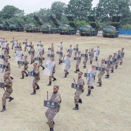 China’s military gives glimpse of updated long-range rocket system ...