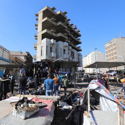 At least 32 killed as twin suicide bombings rock Iraqi capital of ...
