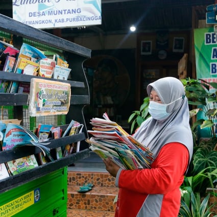 In Indonesia, children swap litter for literacy at travelling eco ...