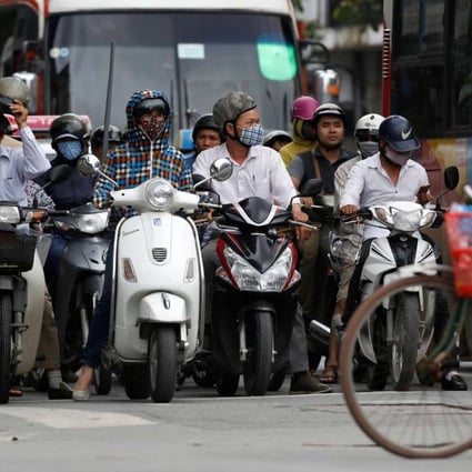 Vietnamese consider banning bicycles in Hanoi as motorcycles threaten ...