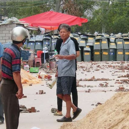 Tear gas, rubber bullets fired as Chinese riot police clash with ...