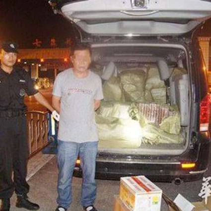 Van driver stopped by police in southwest China carrying nearly tonne ...