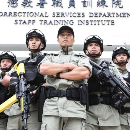 Hong Kong prison officers go through tough training regime to join ...