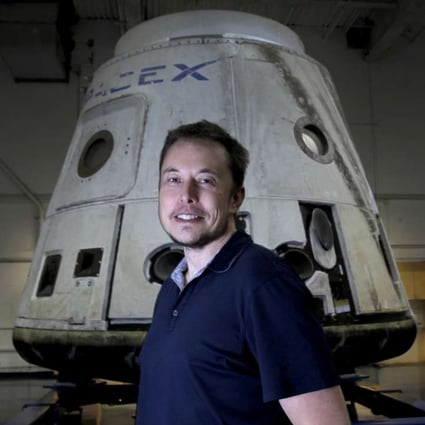 SpaceX announces it will fly two people around the moon next year, a ...