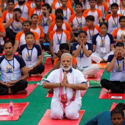 Yoga connecting world, says Indian PM Modi as millions roll out the ...