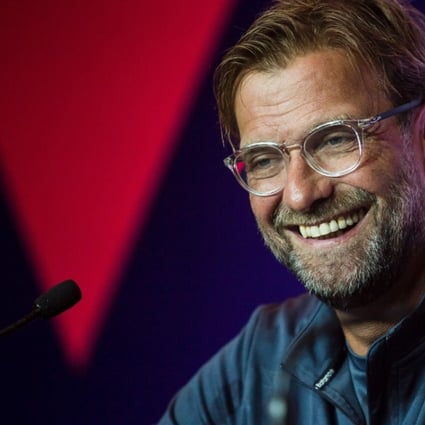 Liverpool boss Jurgen Klopp has a smile on his face again as Hong Kong ...
