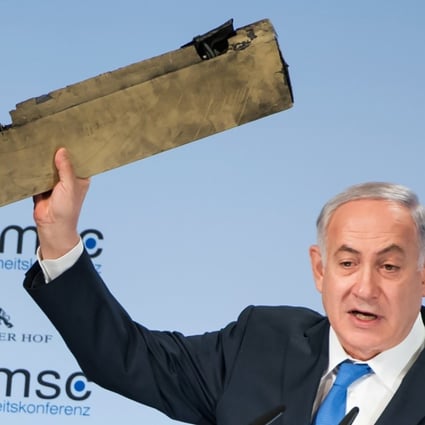 Netanyahu, waving ‘Iranian drone wreckage‘, urges West not to appease ...