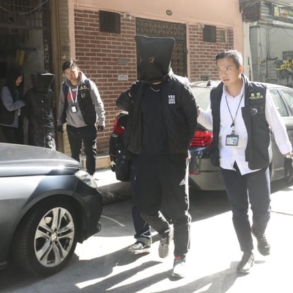 Suspected Hong Kong triad member and girlfriend held after police seize ...